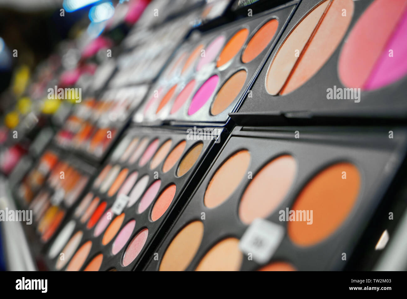 Different cosmetics in modern shop Stock Photo - Alamy
