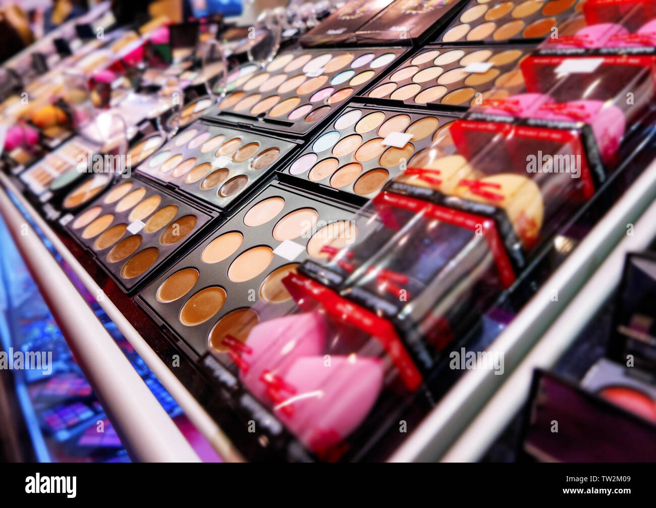 Different cosmetics in modern shop Stock Photo - Alamy