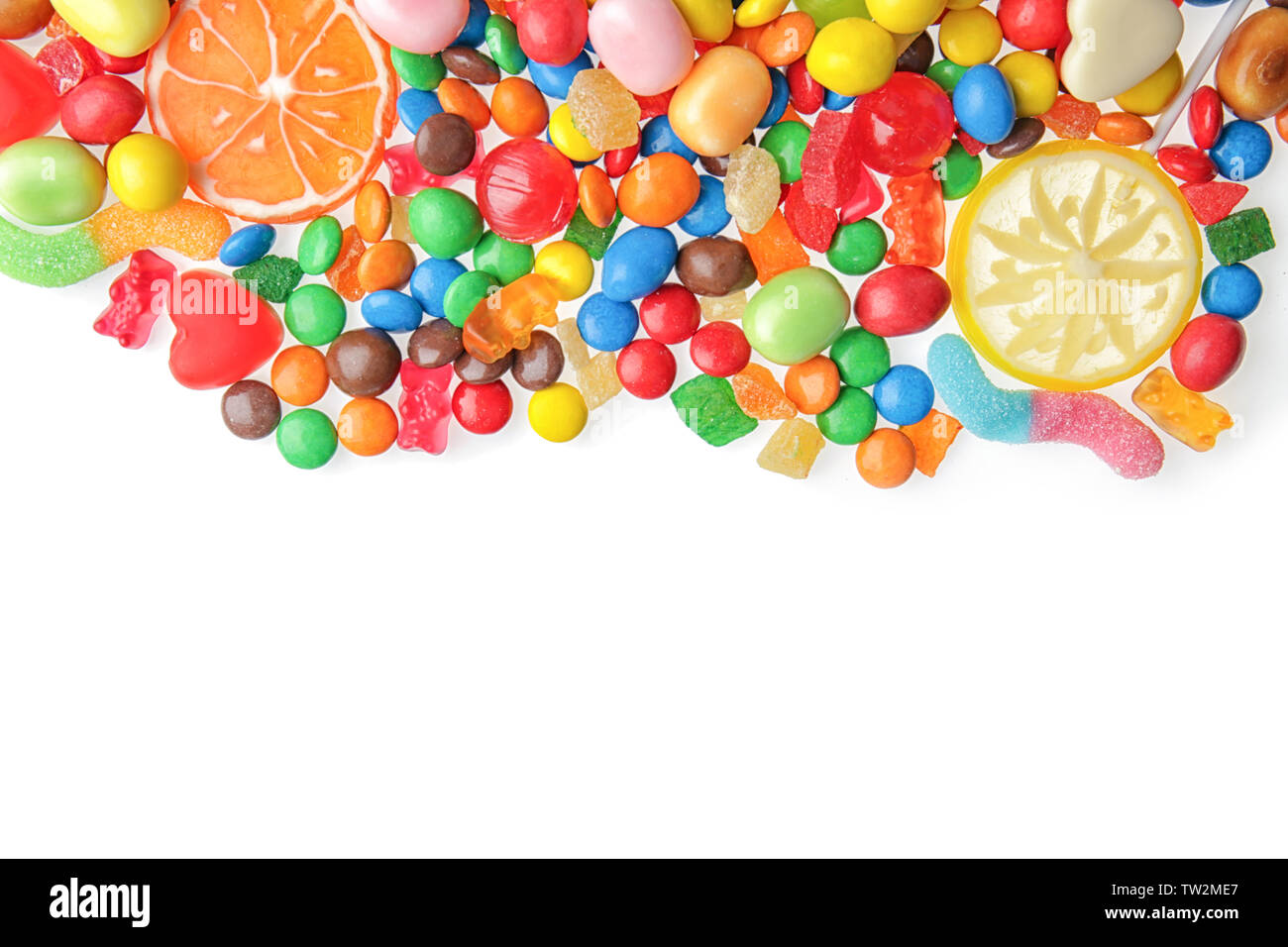 Colorful candies on white background Stock Photo - Alamy