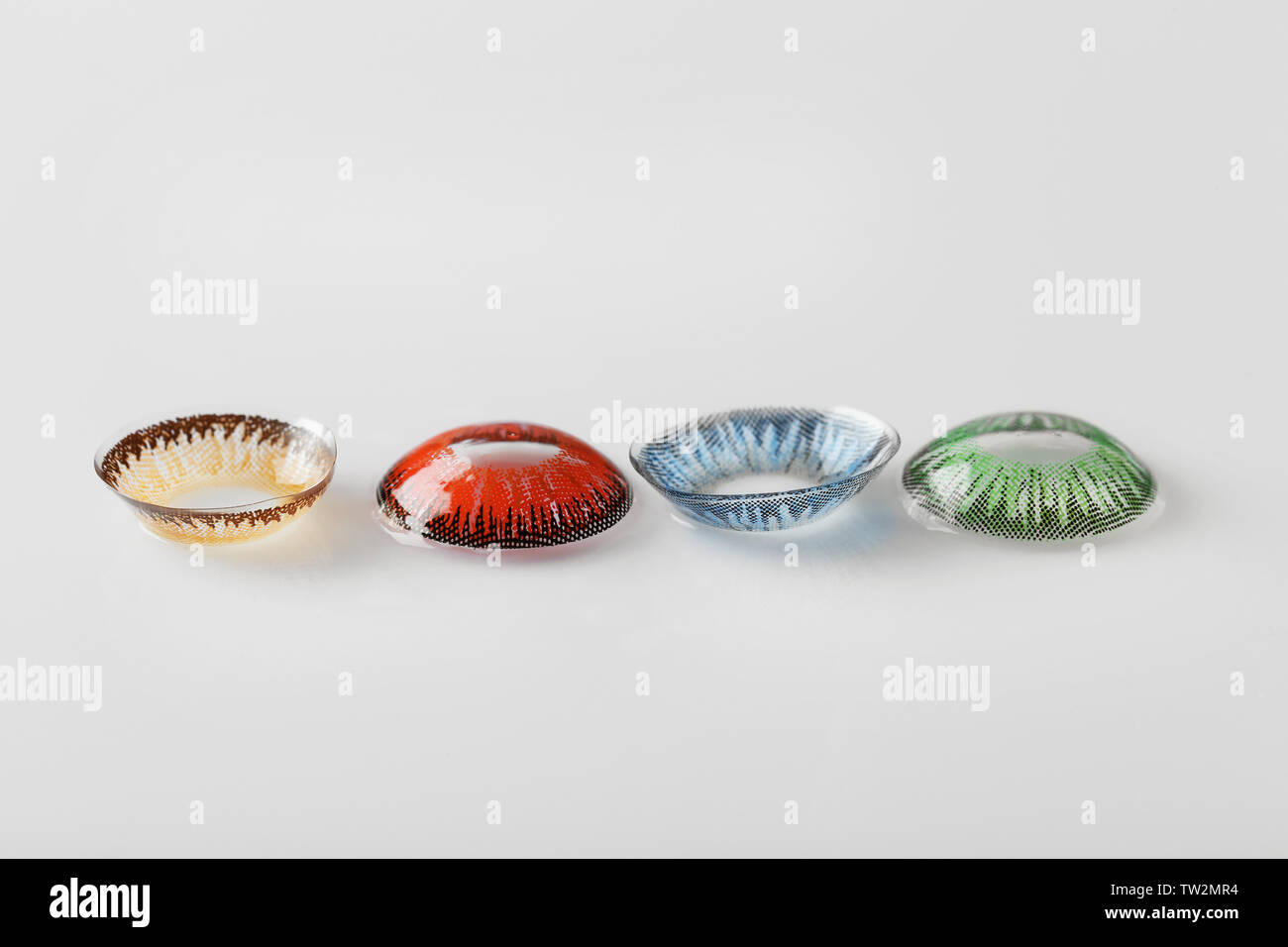 Color contact lenses on white background Stock Photo - Alamy
