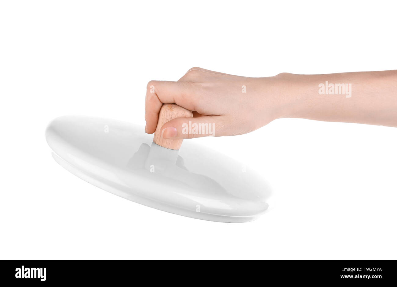 Woman holding cap for cooking classes on white background Stock Photo ...