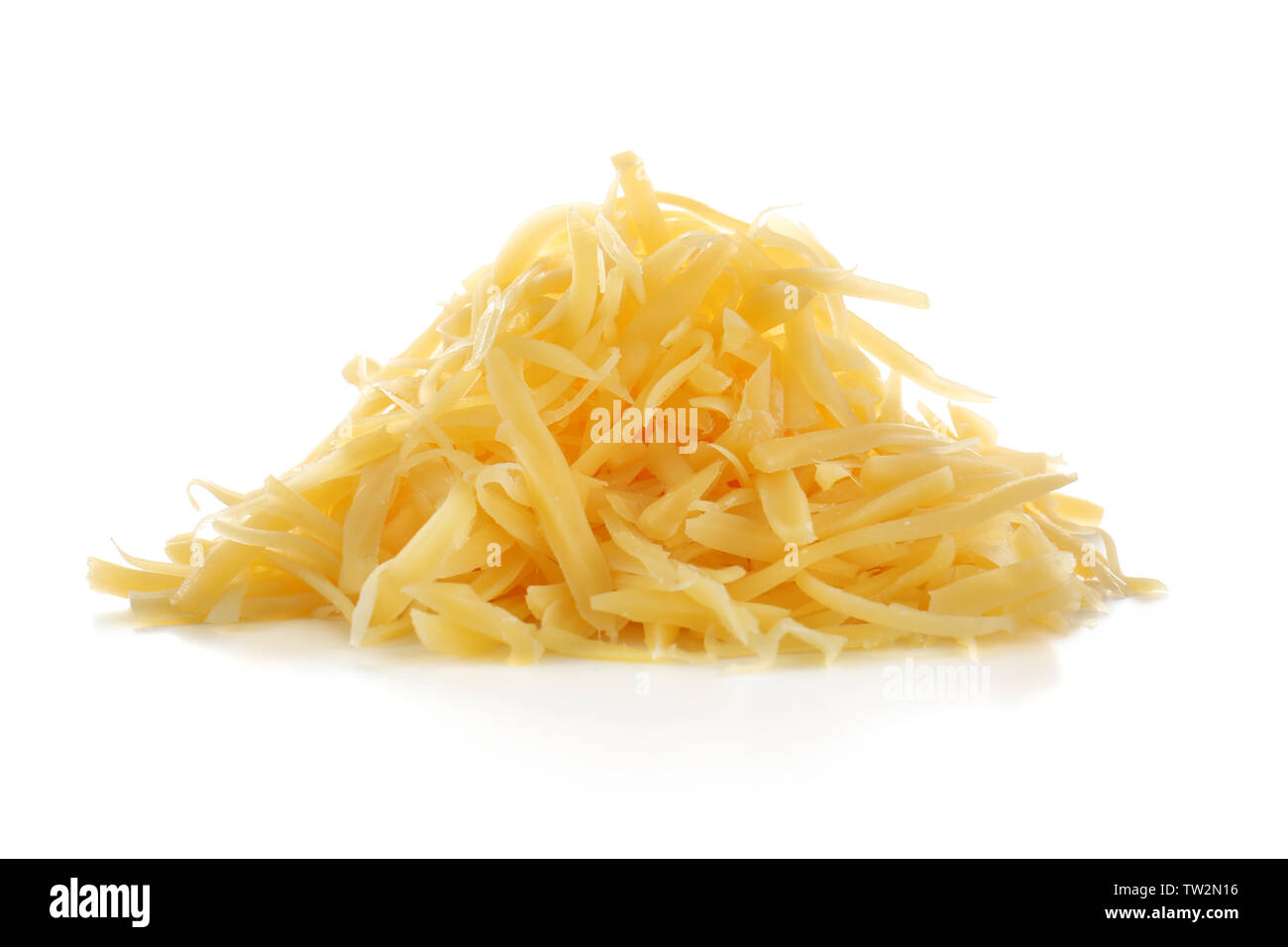 Pile of grated cheese on white background Stock Photo - Alamy