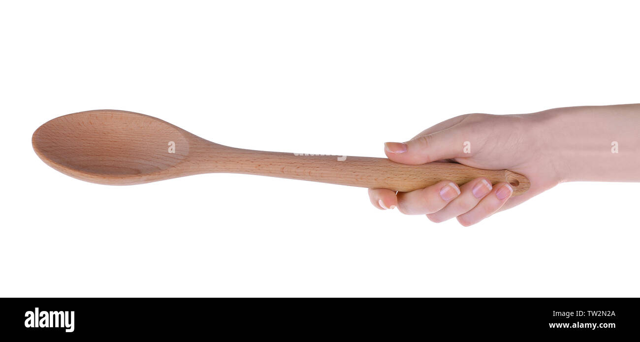 Hand holding wooden spoon isolated hi-res stock photography and images ...