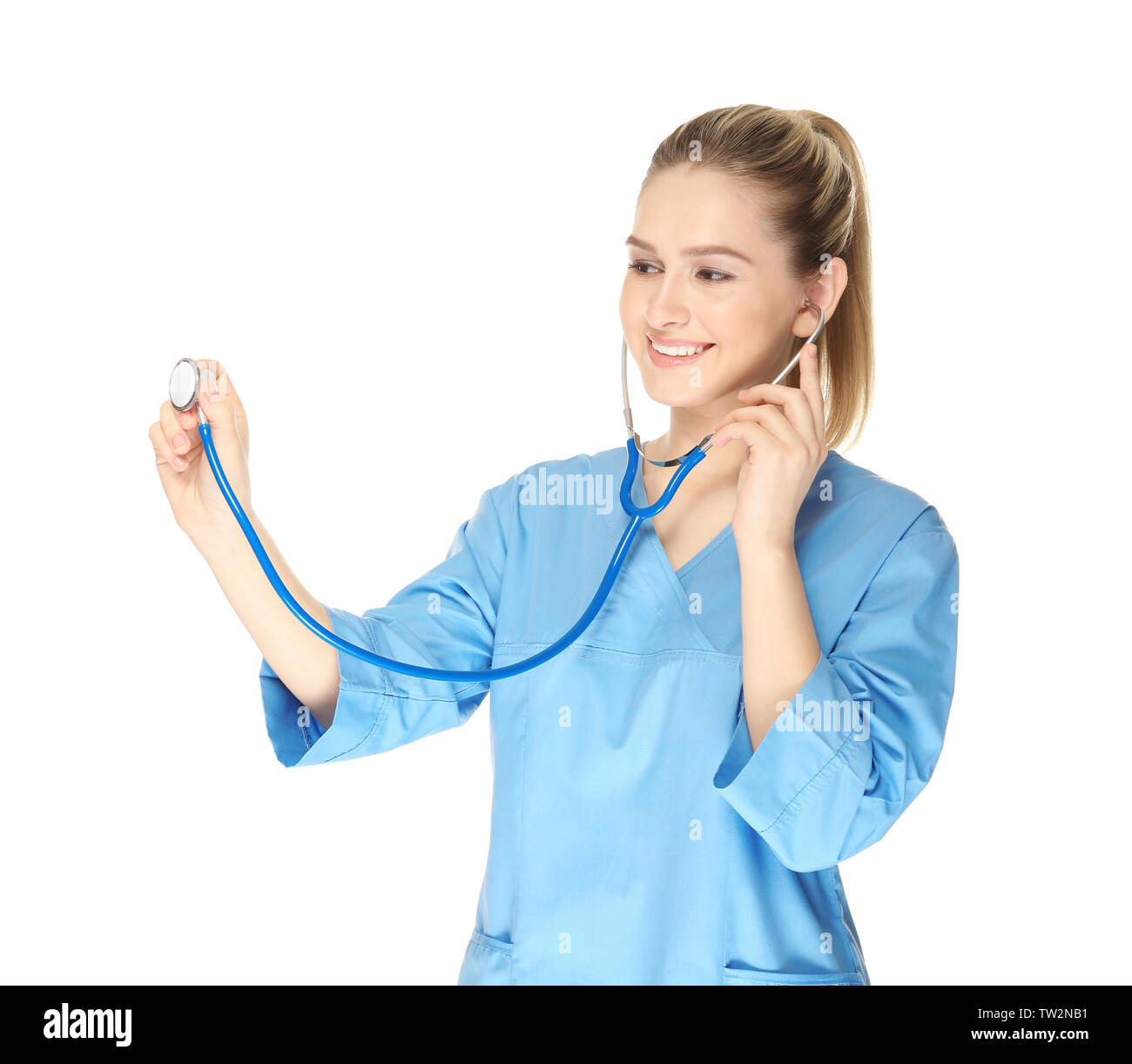 Young medical assistant with stethoscope on white background Stock ...