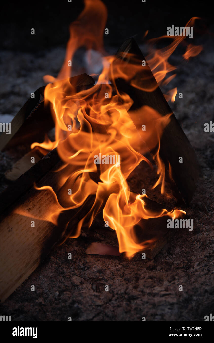 fire burnig small wood boards burning in a grill Stock Photo - Alamy