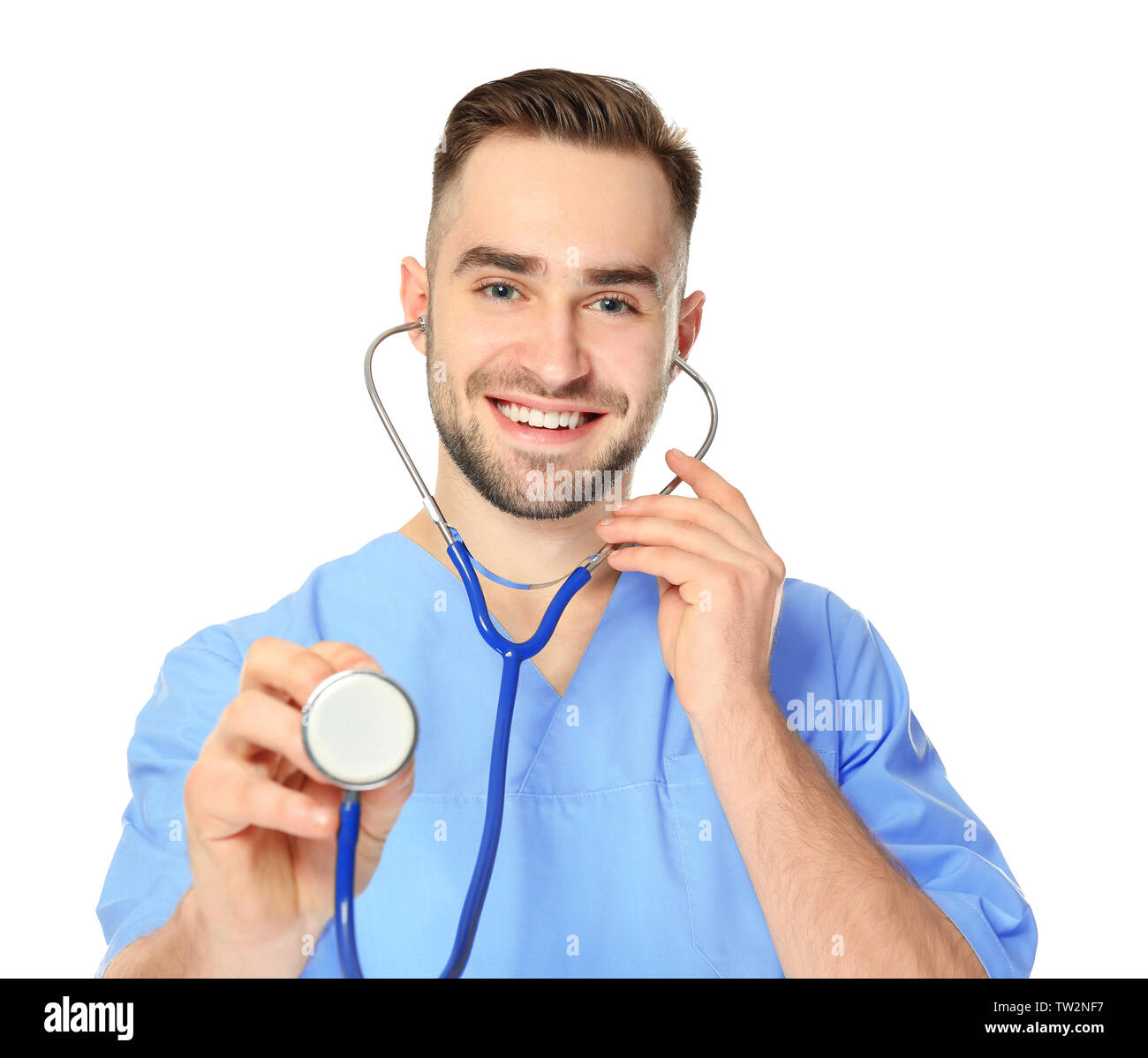 Young medical assistant with stethoscope on white background Stock ...