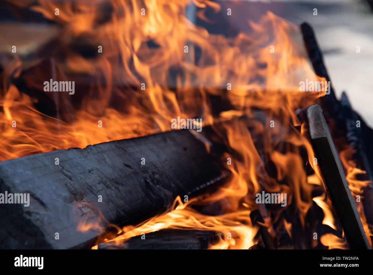 fire burnig small wood boards burning in a grill Stock Photo - Alamy