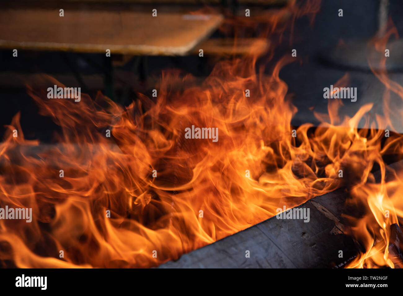 fire burnig small wood boards burning in a grill Stock Photo - Alamy