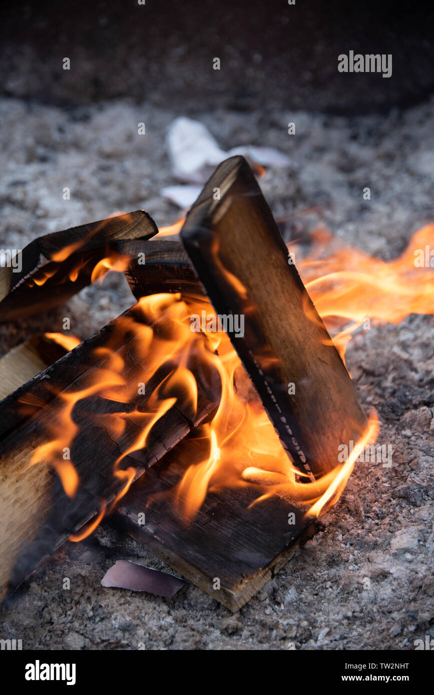 fire burnig small wood boards burning in a grill Stock Photo - Alamy