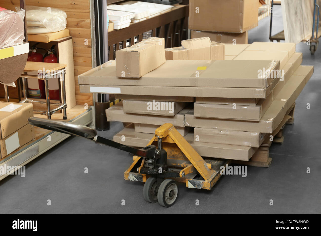 Warehouse building trolley boxes hi-res stock photography and images ...