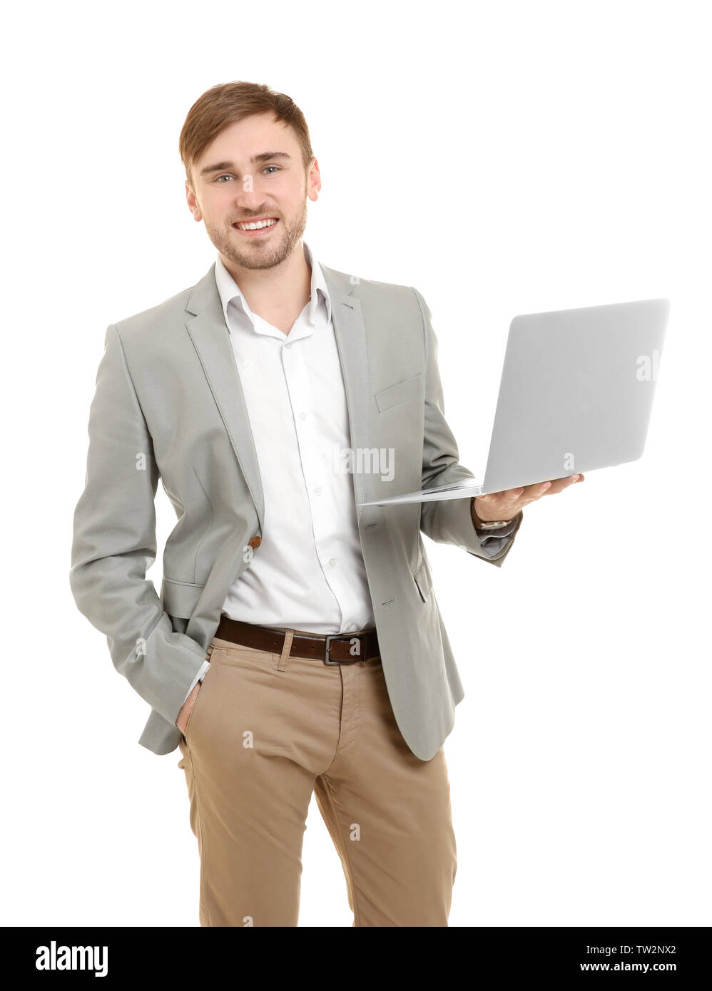 Handsome young man with laptop on white background Stock Photo - Alamy