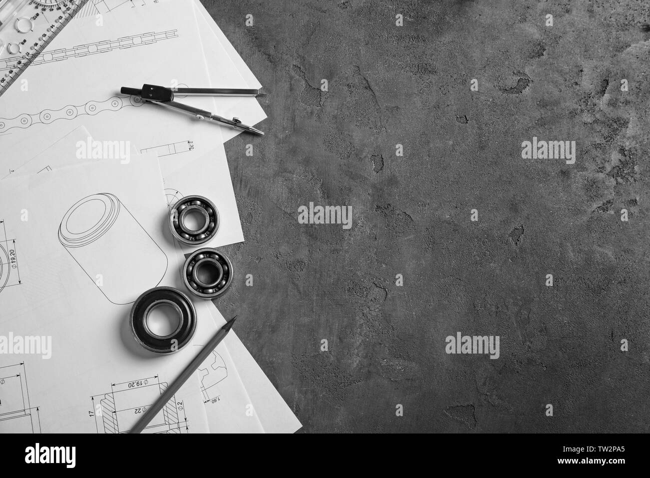 Engineering supplies and part blueprints on workplace Stock Photo - Alamy