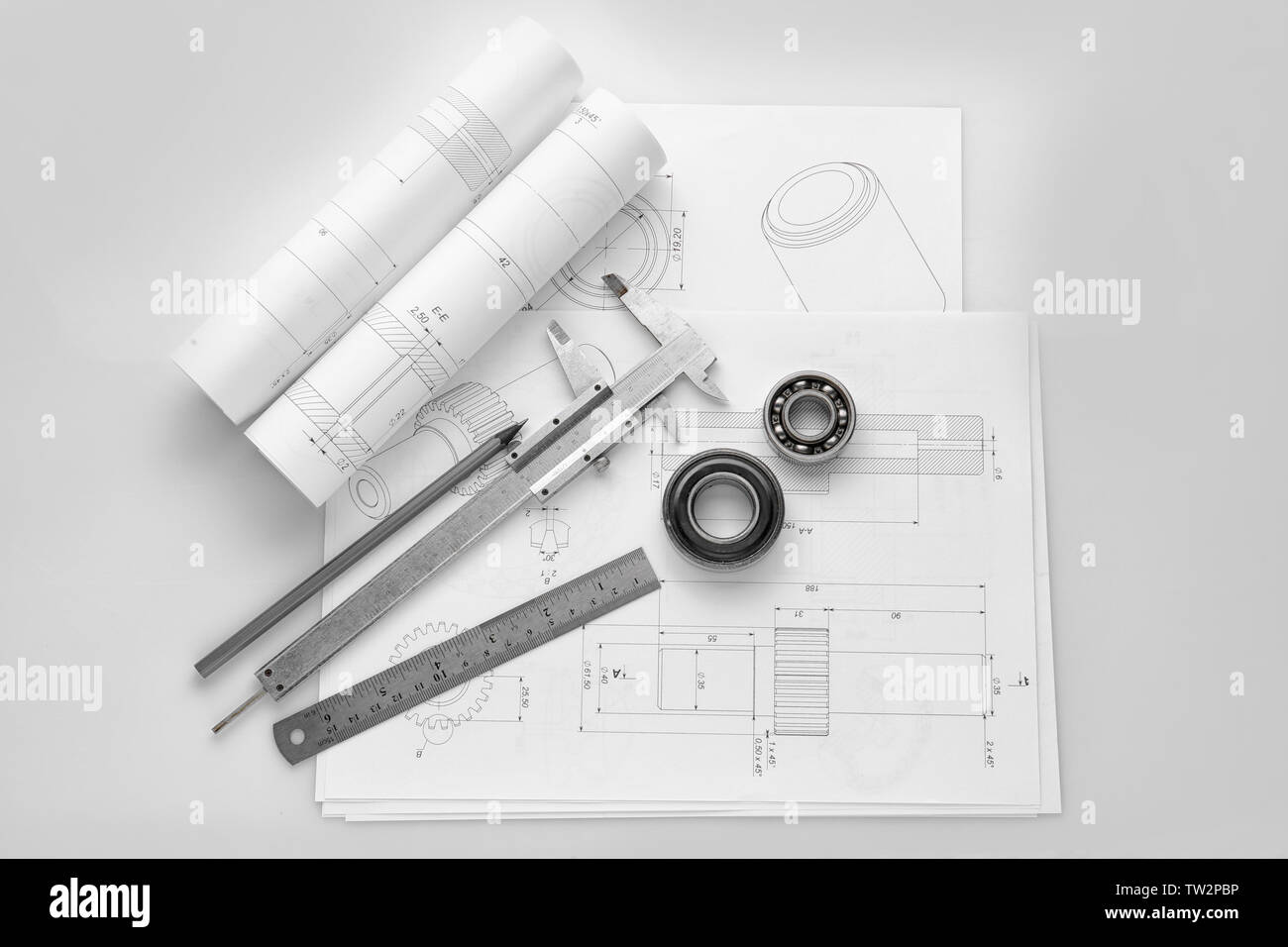 Engineering supplies and part blueprints on white background Stock ...