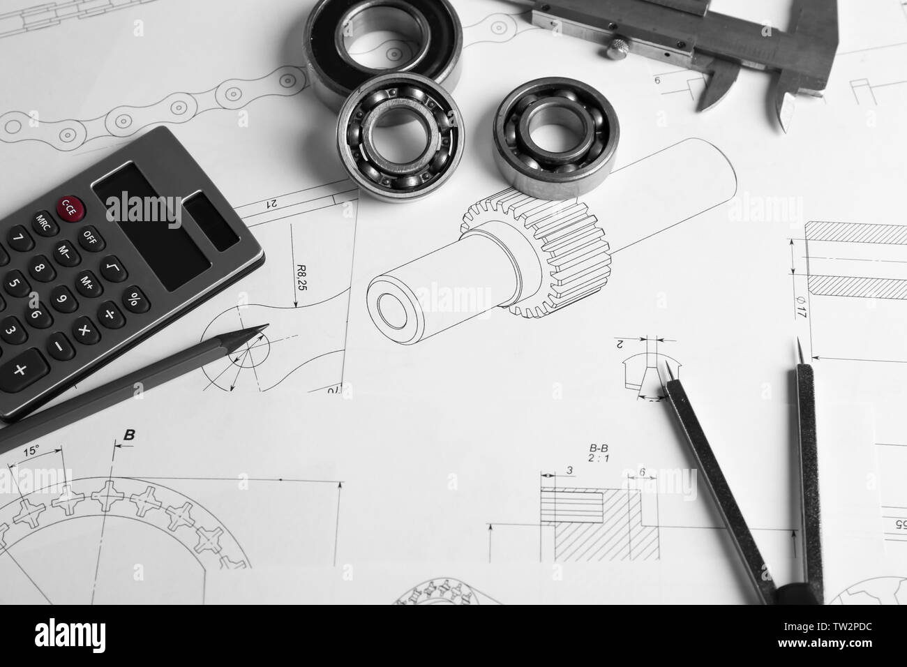 Engineering supplies and part blueprints on workplace Stock Photo - Alamy