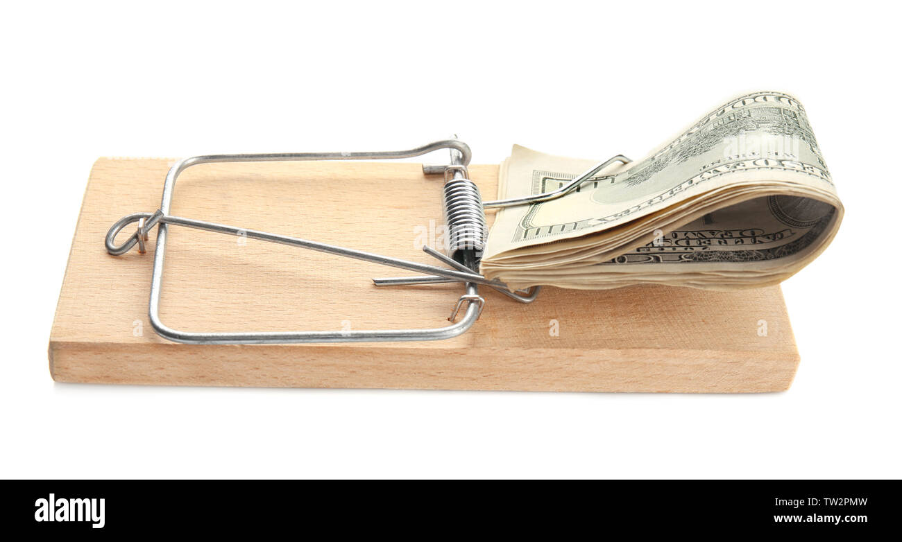 Pile of banknotes in mouse trap on white background. Concept of money ...
