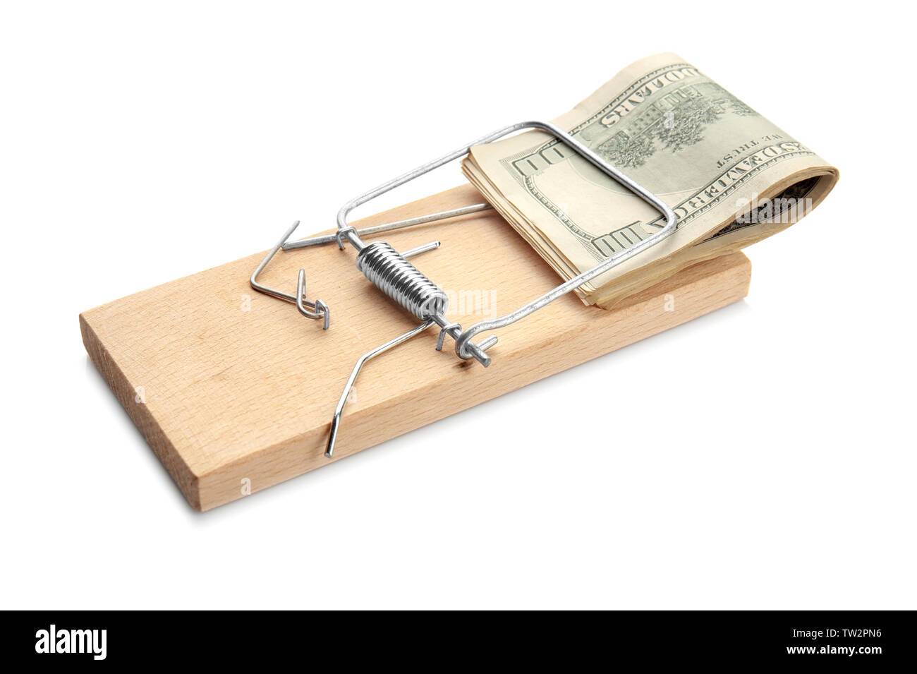 Pile of banknotes in mouse trap on white background. Concept of money ...