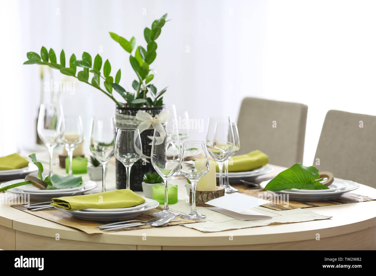Table setting for dinner in restaurant Stock Photo - Alamy