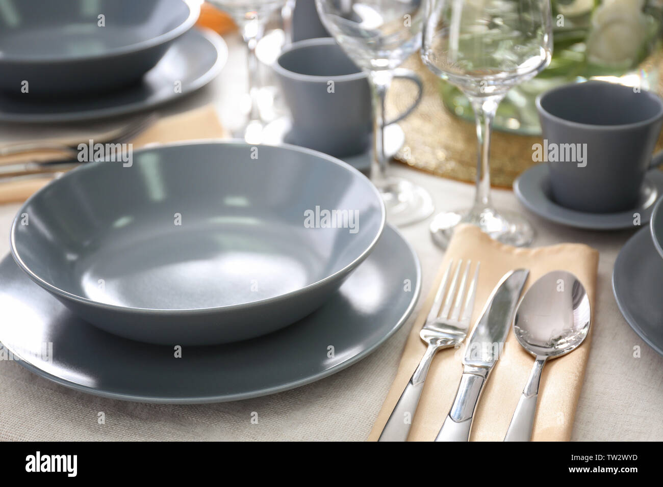 Table setting for dinner in restaurant Stock Photo - Alamy