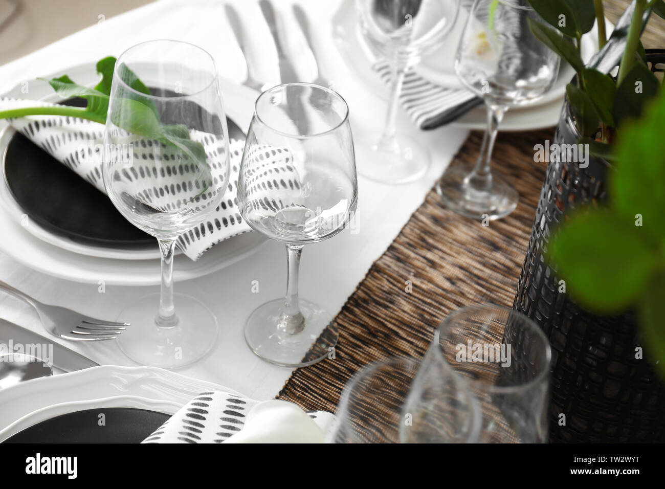Table setting for dinner in restaurant Stock Photo - Alamy
