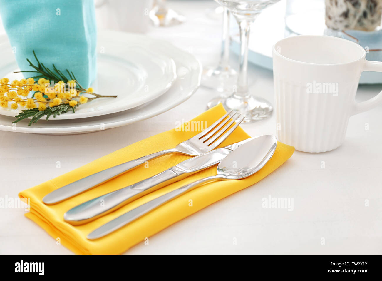 Table setting for dinner in restaurant Stock Photo - Alamy
