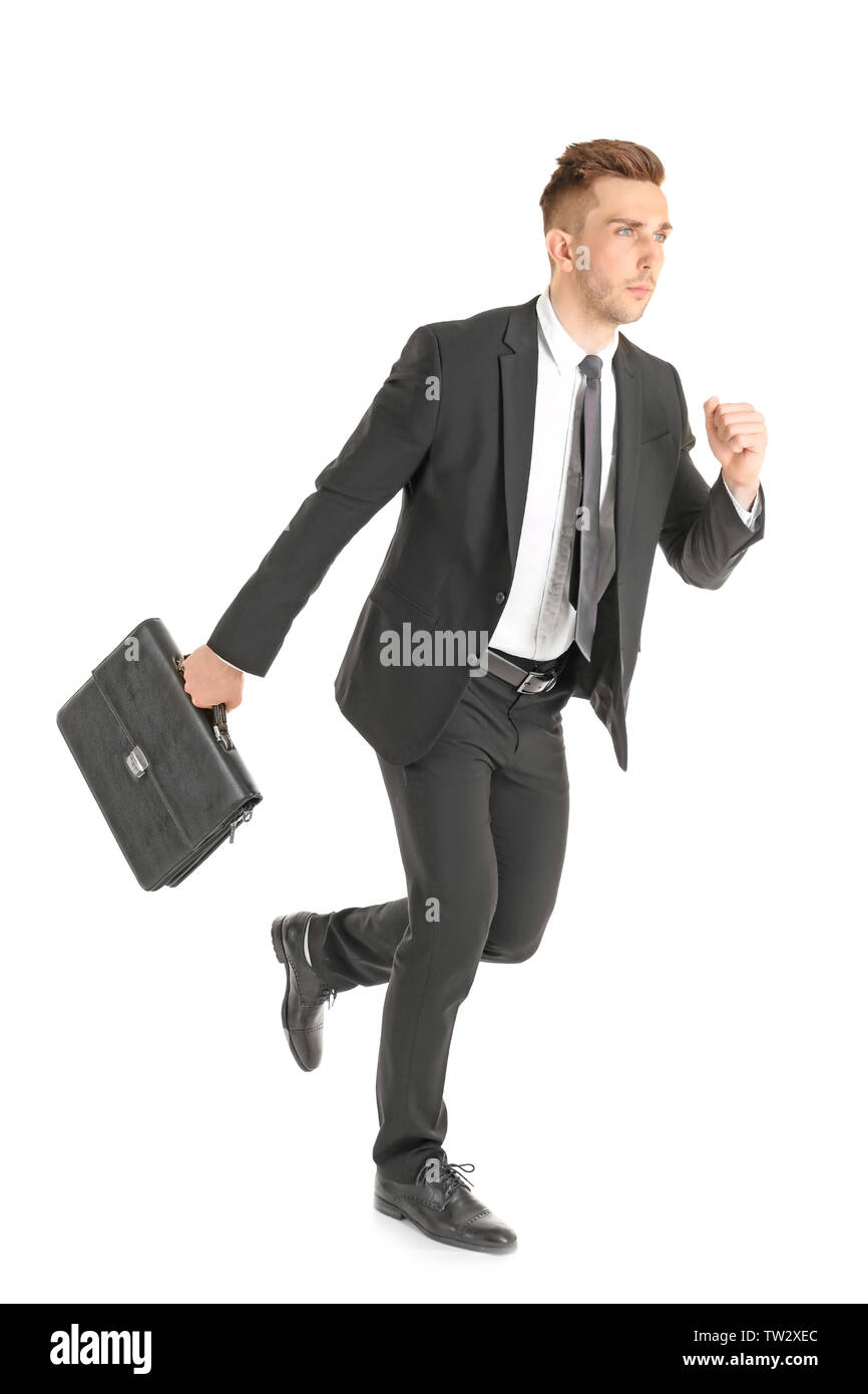 Handsome running businessman on white background Stock Photo - Alamy