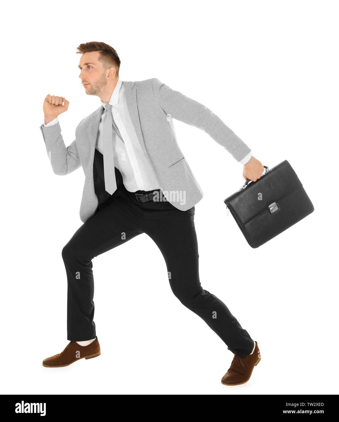 Handsome running businessman on white background Stock Photo - Alamy