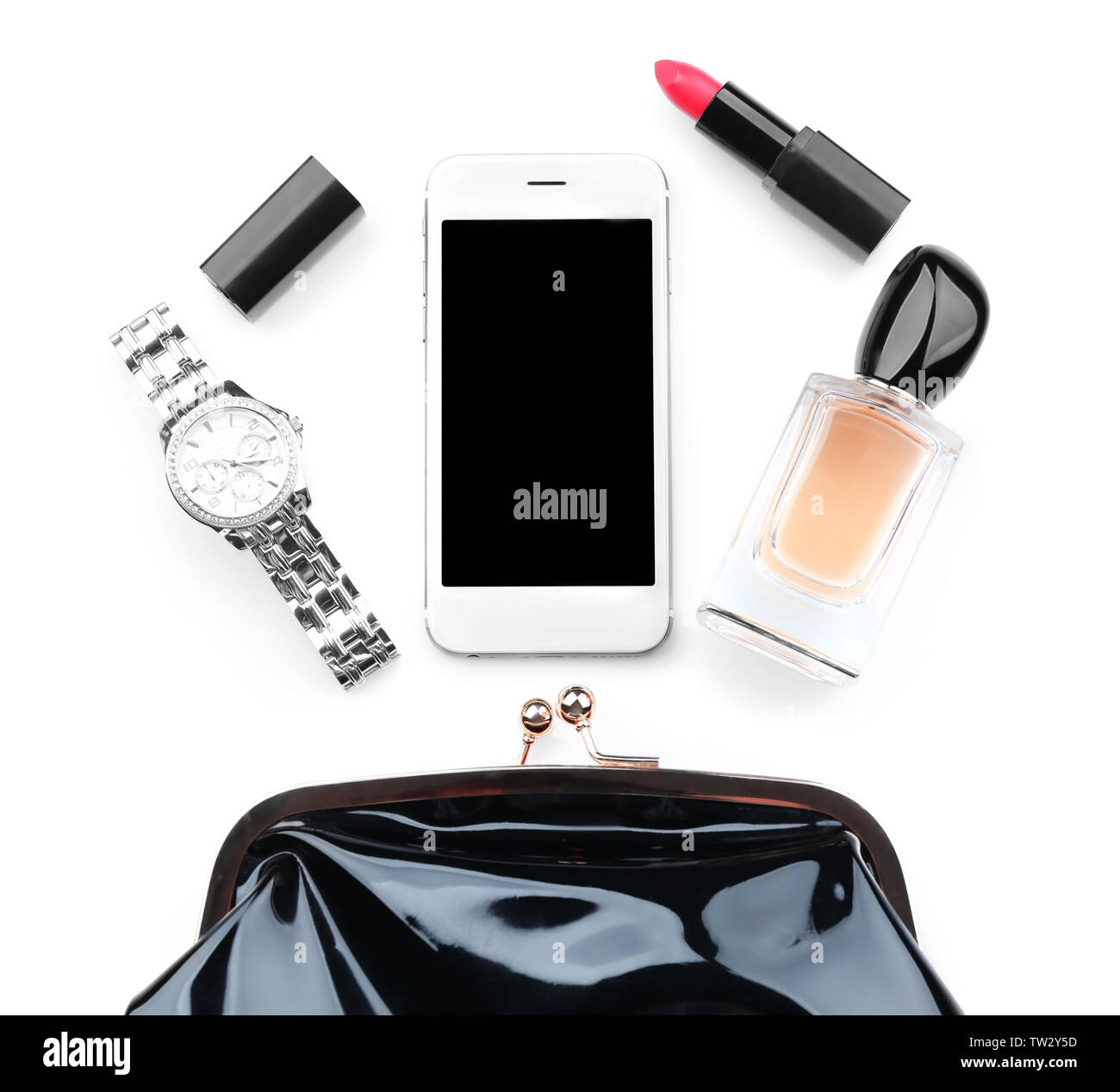 Perfume bottle with cosmetic bag and phone on white background Stock ...