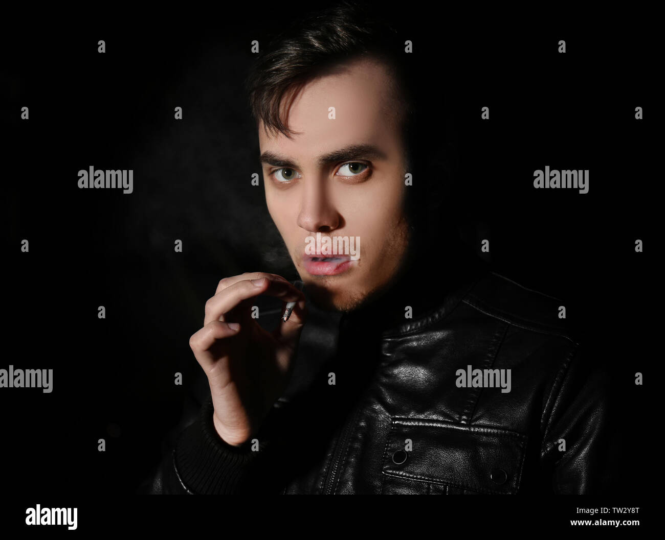 Rasta Man Smoking Joint Marijuana Stock Photos & Rasta Man Smoking ...