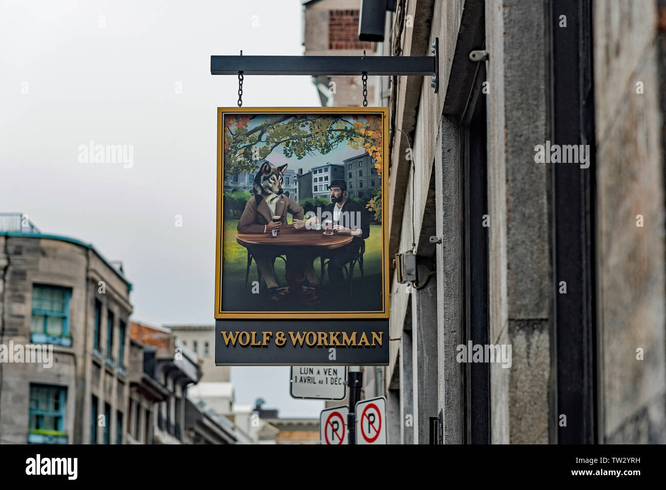 Wolf & Workman sign for pub in Old Montreal, Quebec, Canada Stock Photo ...