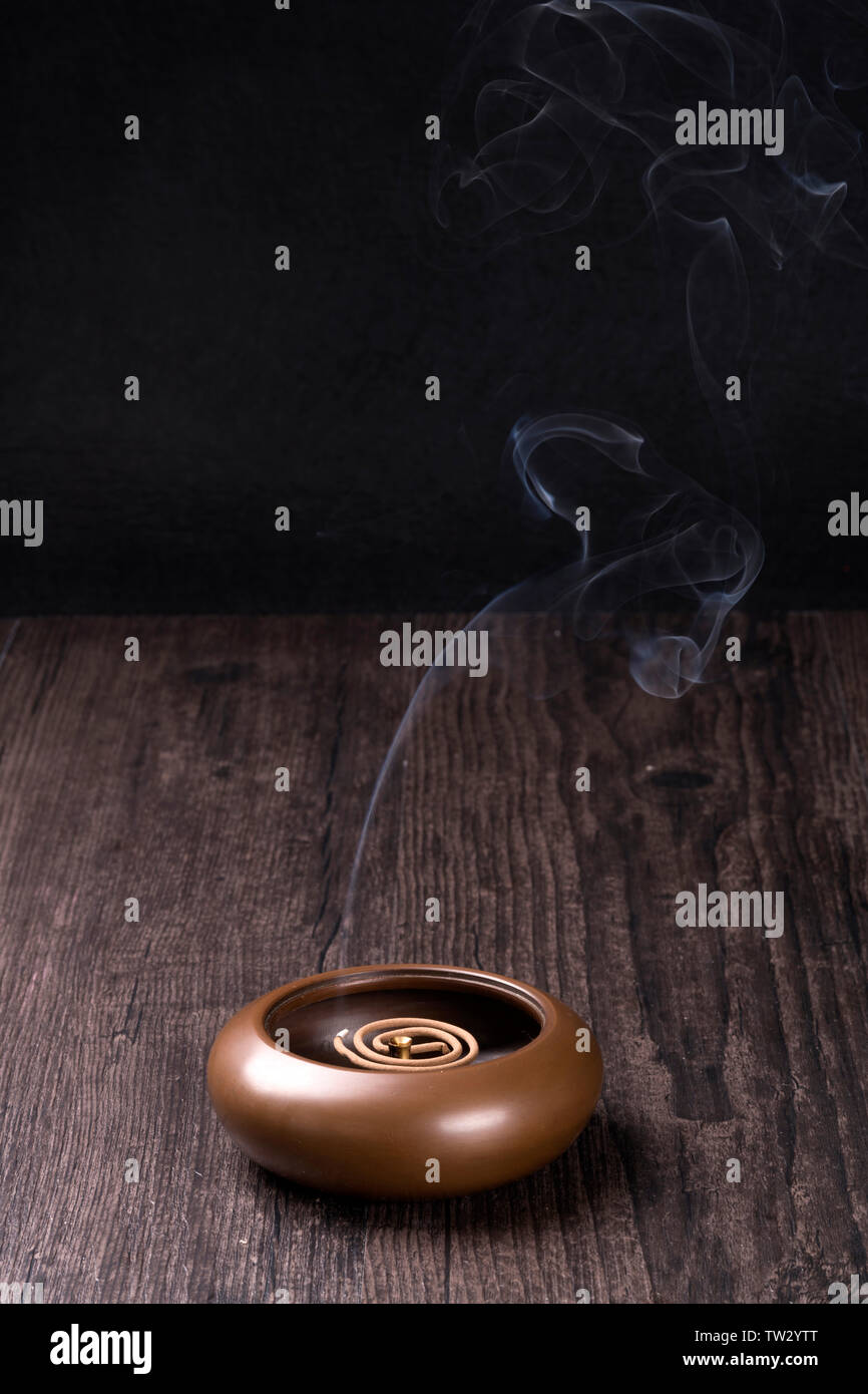 Copper incense stove Stock Photo - Alamy