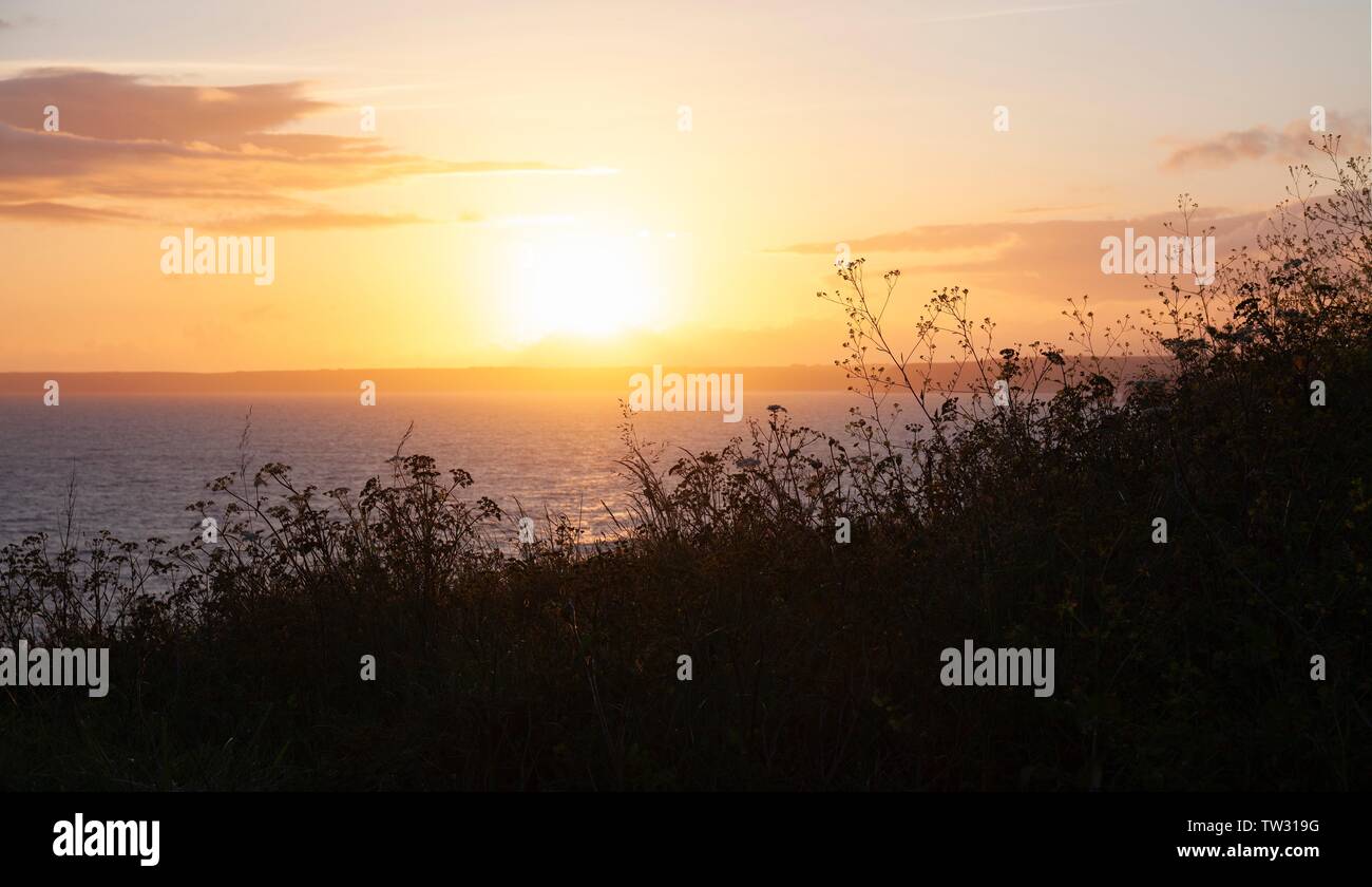 Coastal sunset, Devon, England Stock Photo - Alamy