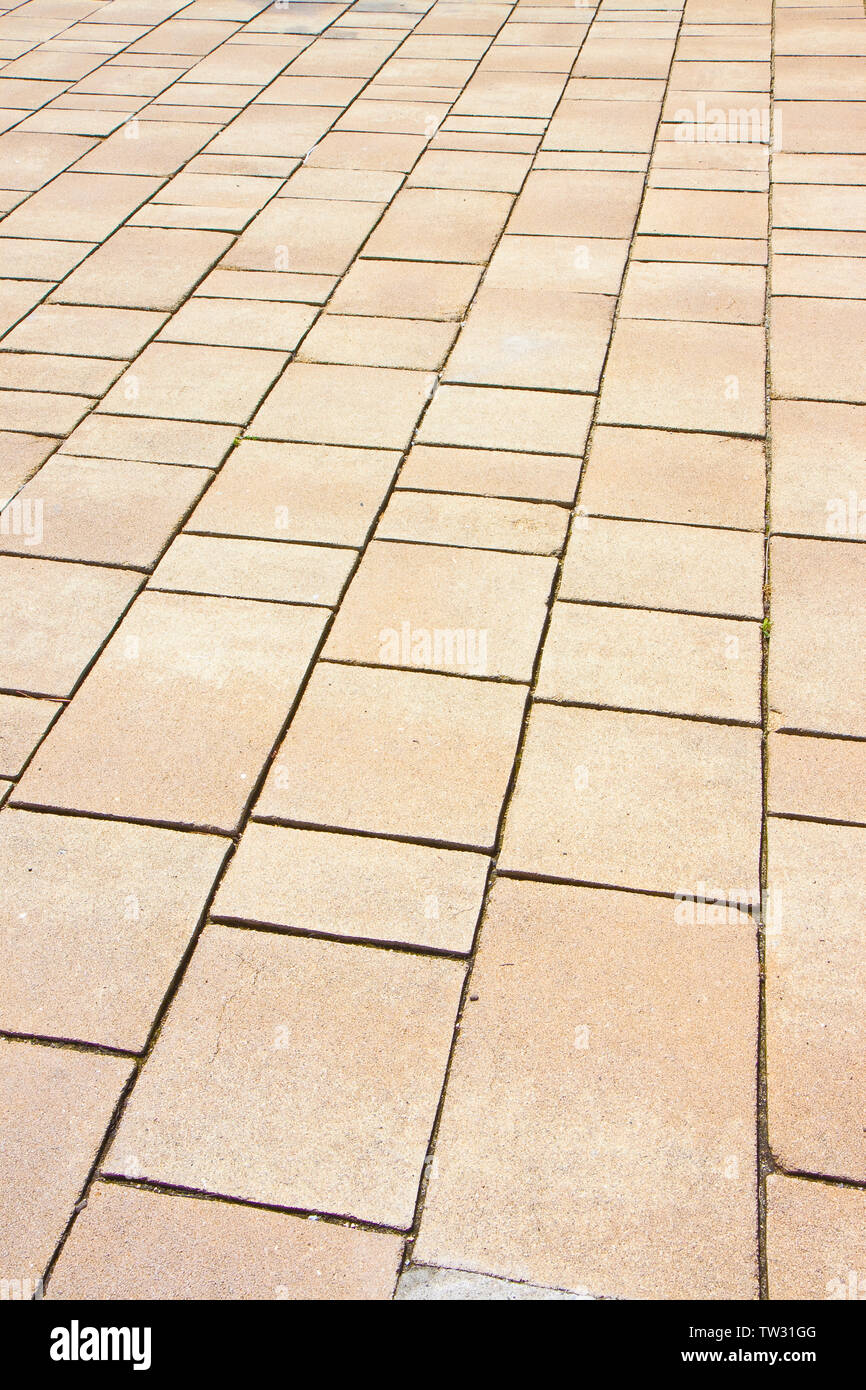 New paving made with colored stone blocks Stock Photo - Alamy
