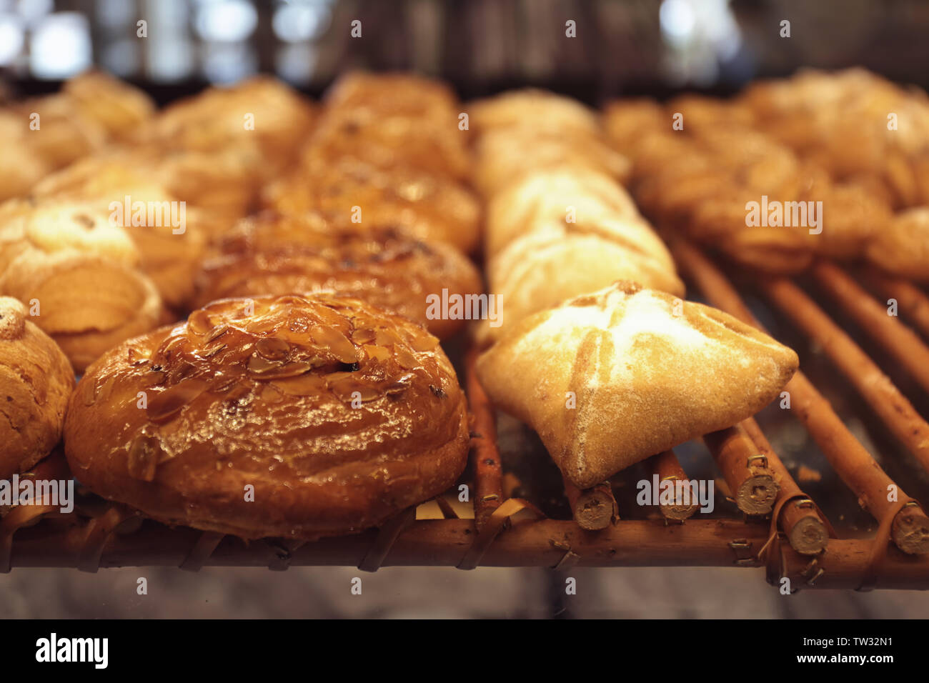 Counter with bakery products in shop, closeup Stock Photo - Alamy