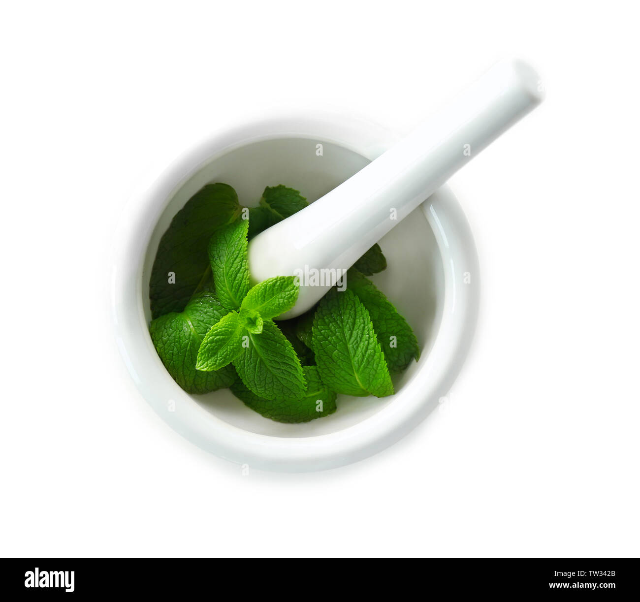 Mortar with leaves of lemon balm on white background Stock Photo - Alamy