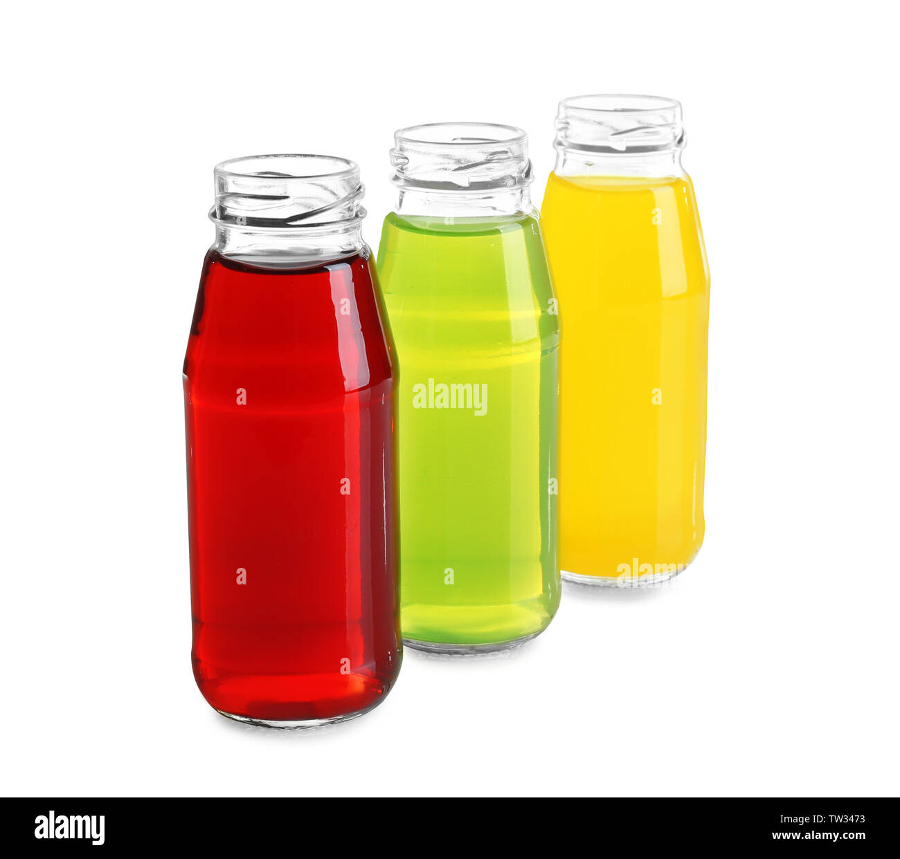 Different juices in bottles on white background Stock Photo - Alamy