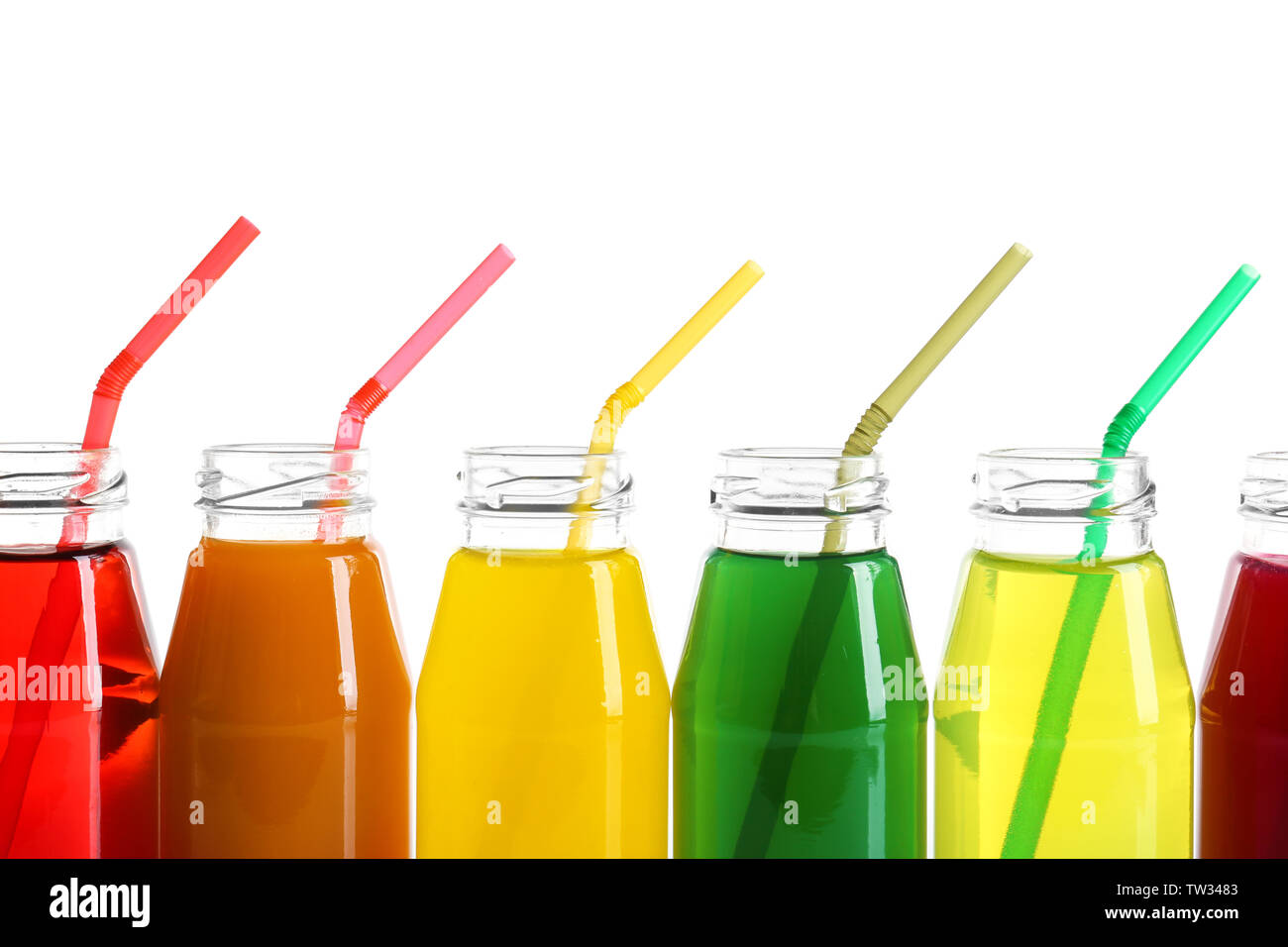 Different juices in bottles on white background Stock Photo - Alamy