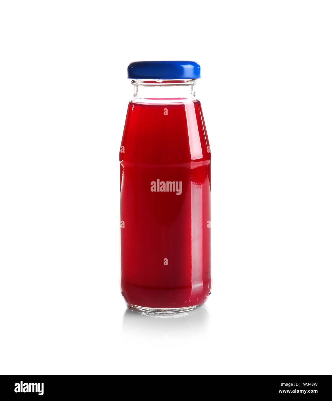 Delicious juice in bottle on white background Stock Photo - Alamy