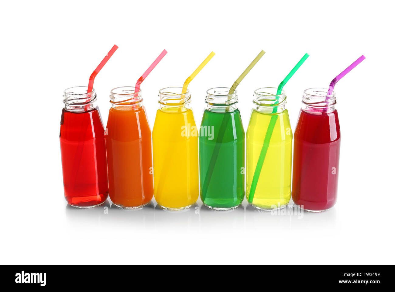 Different juices in bottles on white background Stock Photo - Alamy