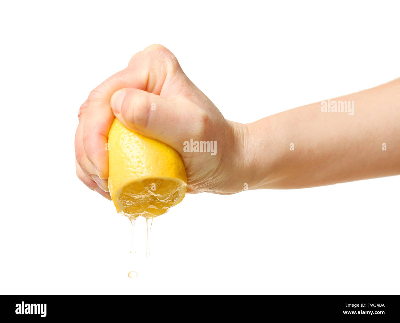 Female hand squeezing half of lemon on white background Stock Photo - Alamy