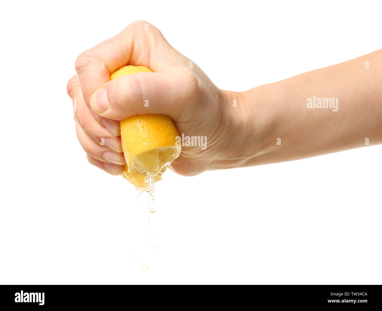 Female hand squeezing half of lemon on white background Stock Photo - Alamy