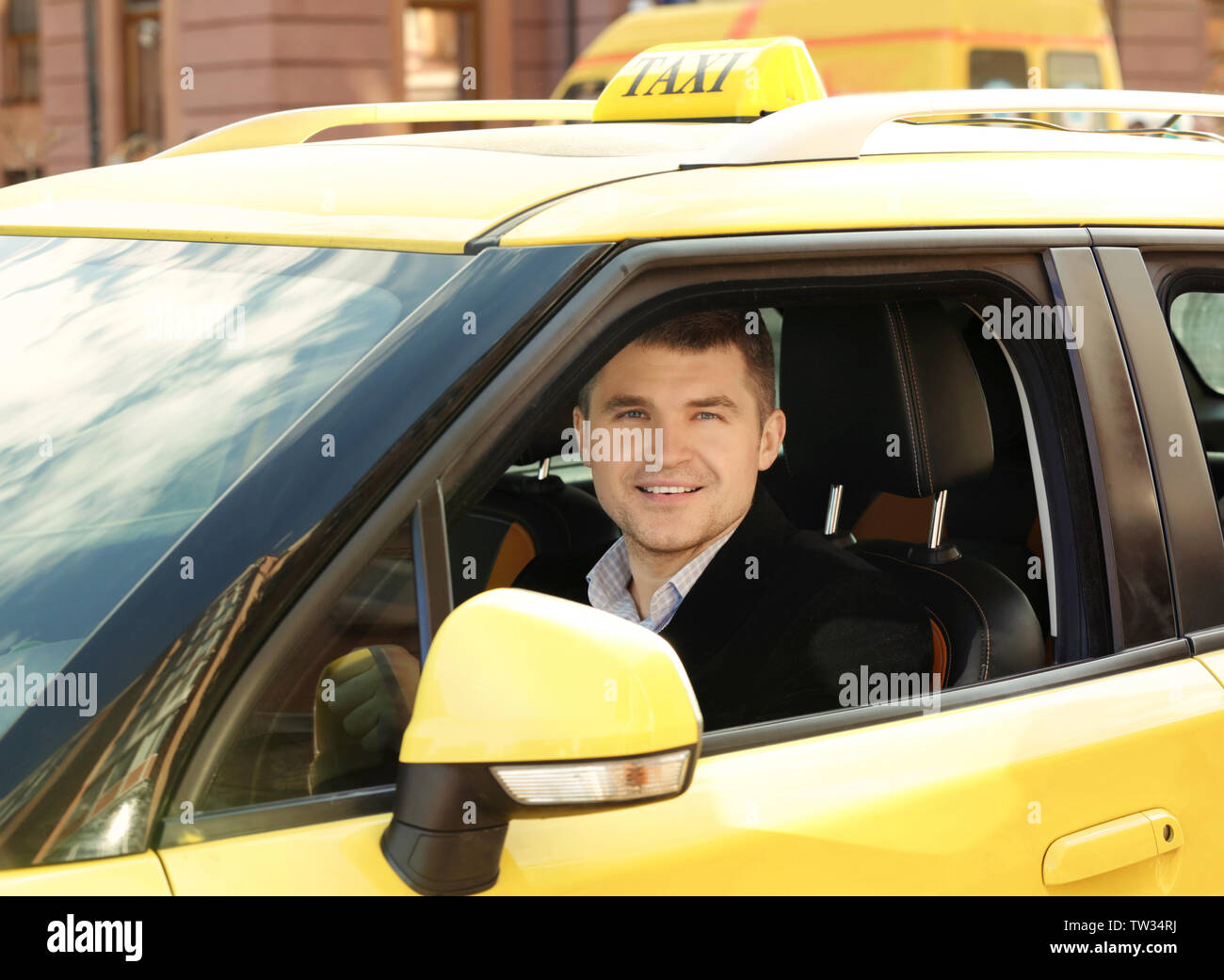 Yellow taxi driver window hi-res stock photography and images - Alamy