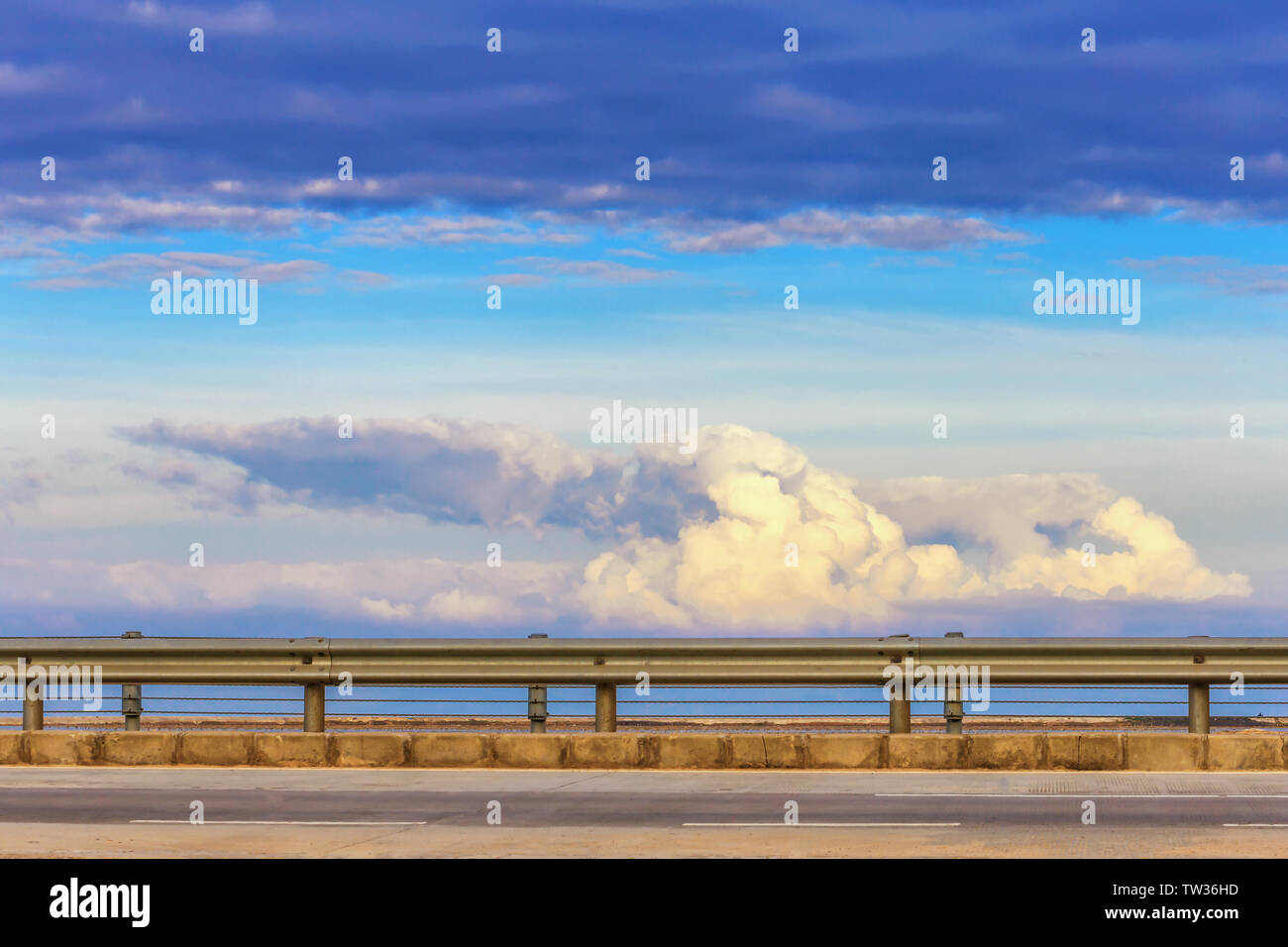 Highway under the blue sky Stock Photo - Alamy