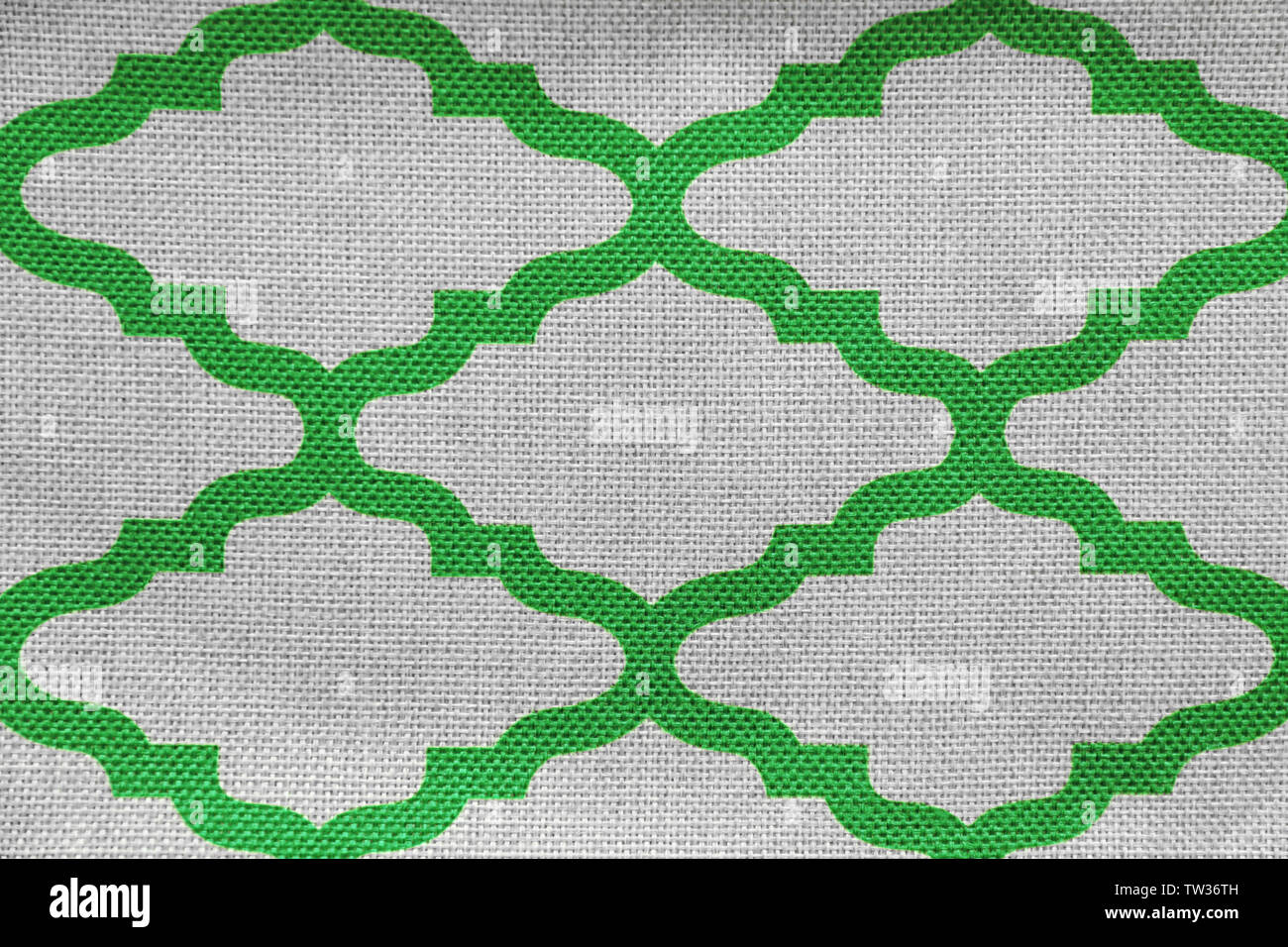 Fabric with green figures, closeup Stock Photo - Alamy