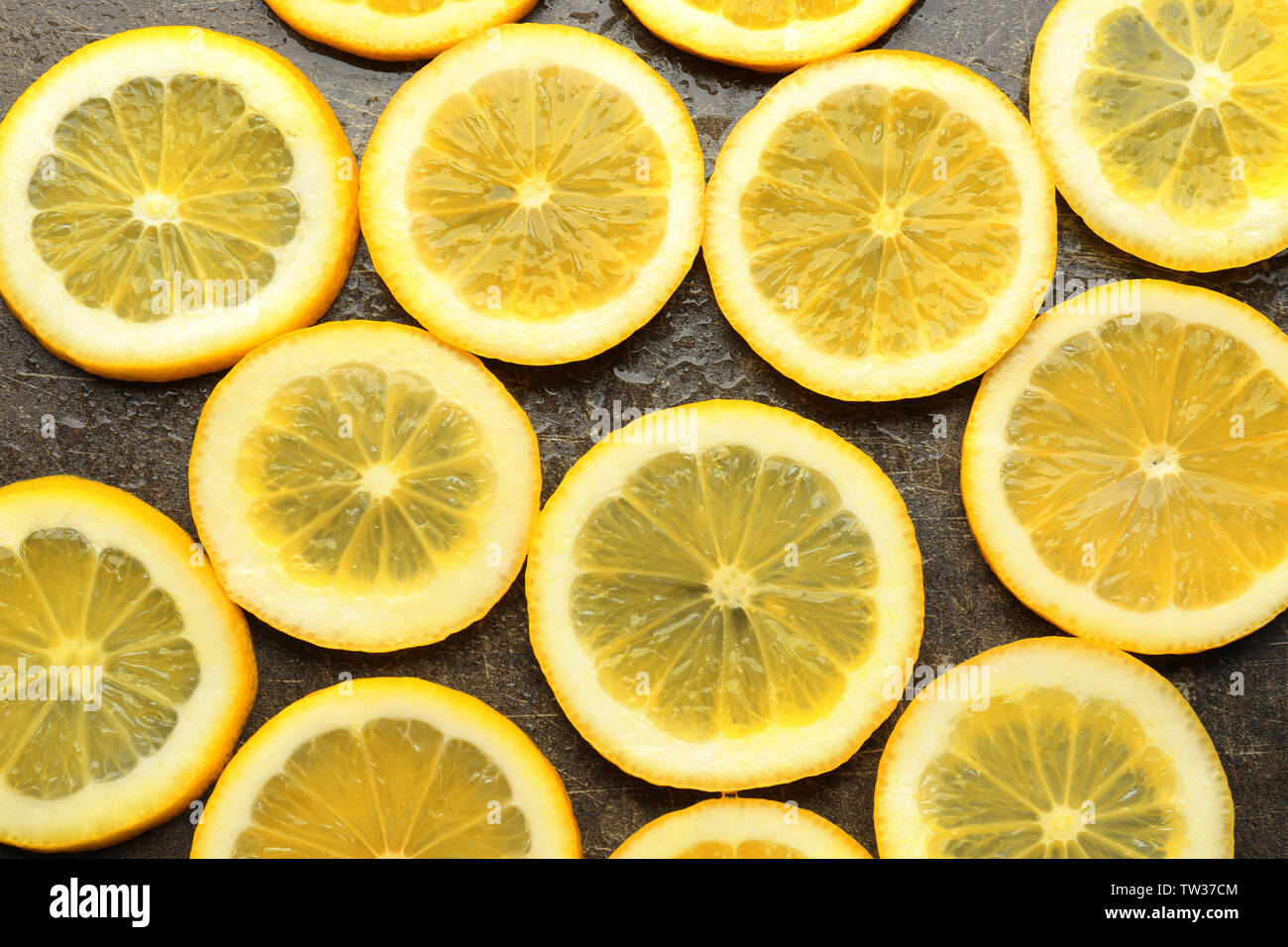 Delicious juicy sliced lemon, closeup Stock Photo - Alamy