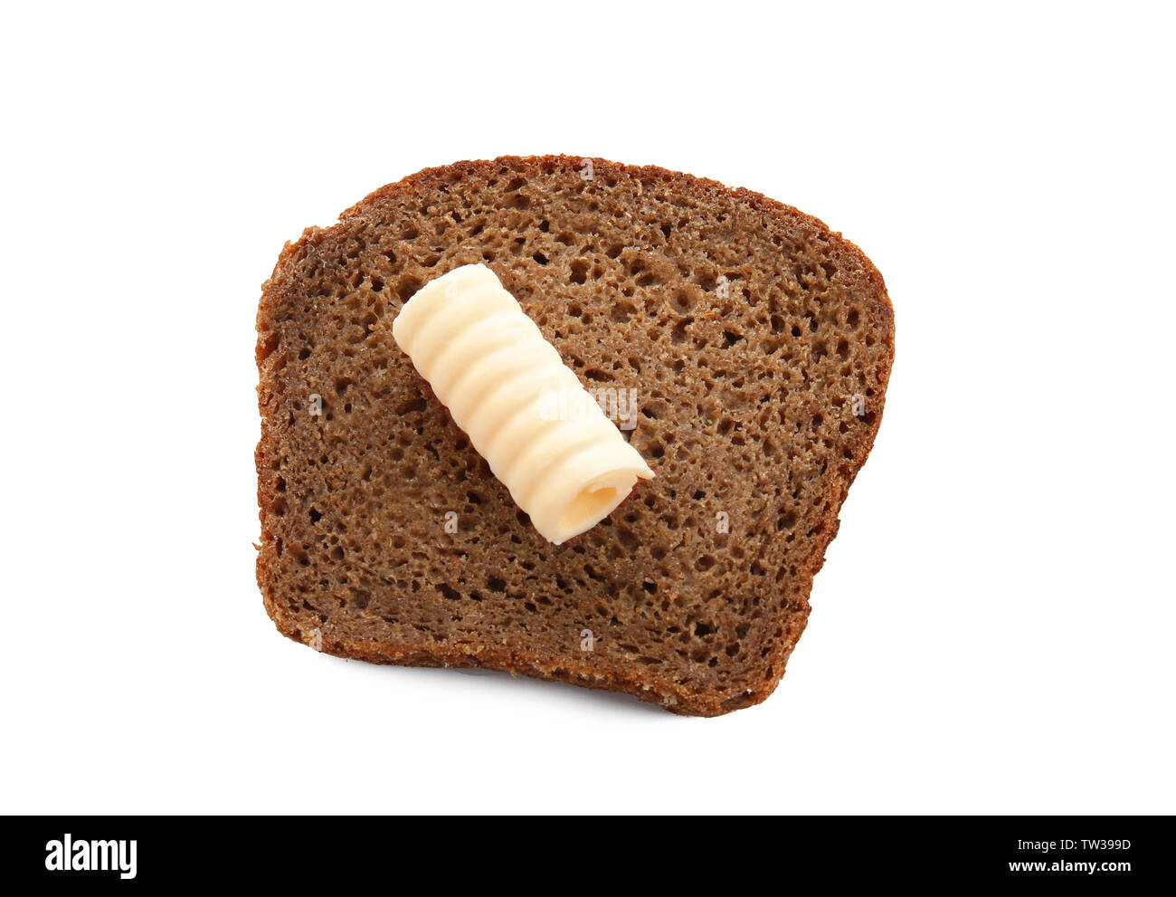 Slice of bread with butter curl on white background Stock Photo - Alamy