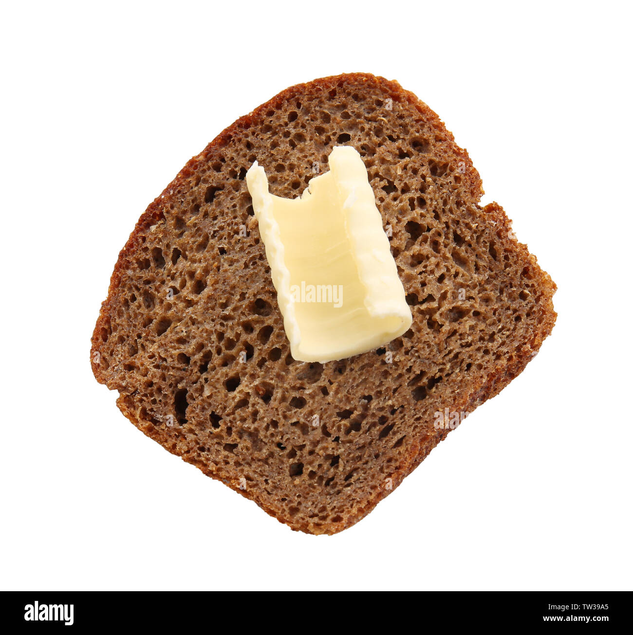 Slice of bread with butter curl on white background Stock Photo - Alamy