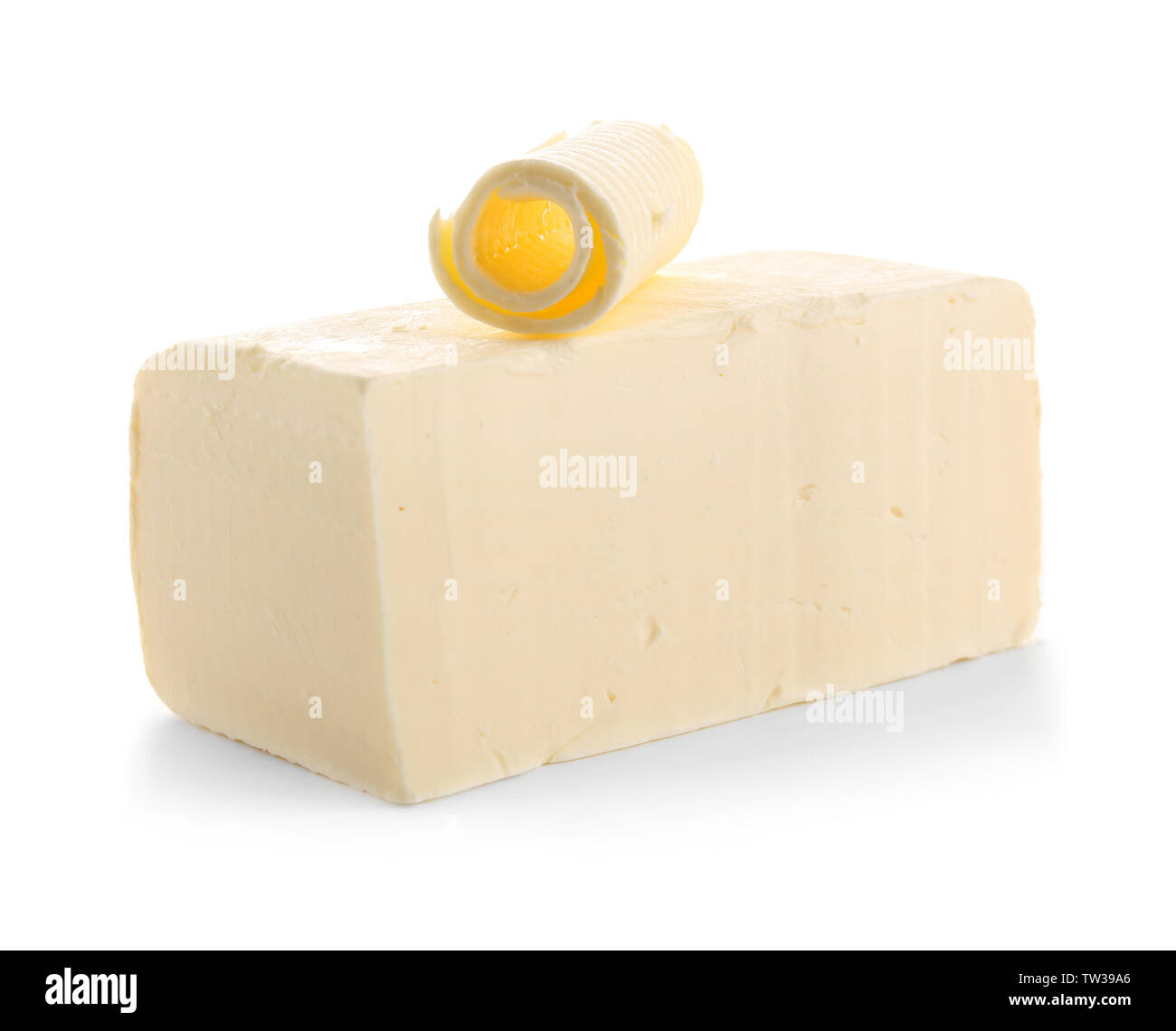 Piece of butter on white background Stock Photo - Alamy
