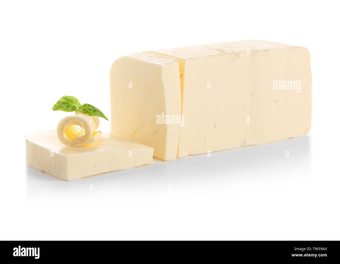 Cut piece of butter on white background Stock Photo - Alamy