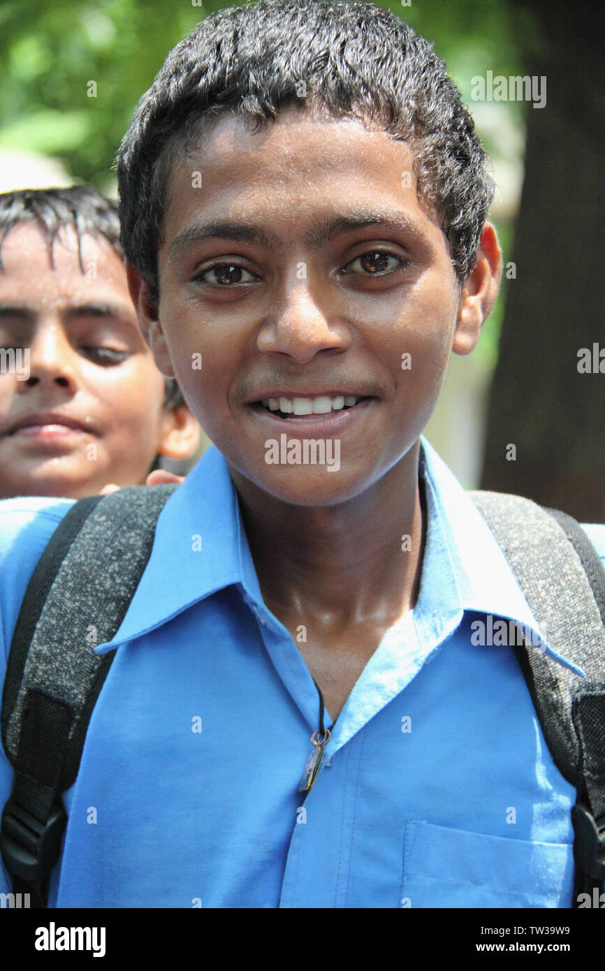 Portrait of a schoolboy smiling Stock Photo - Alamy