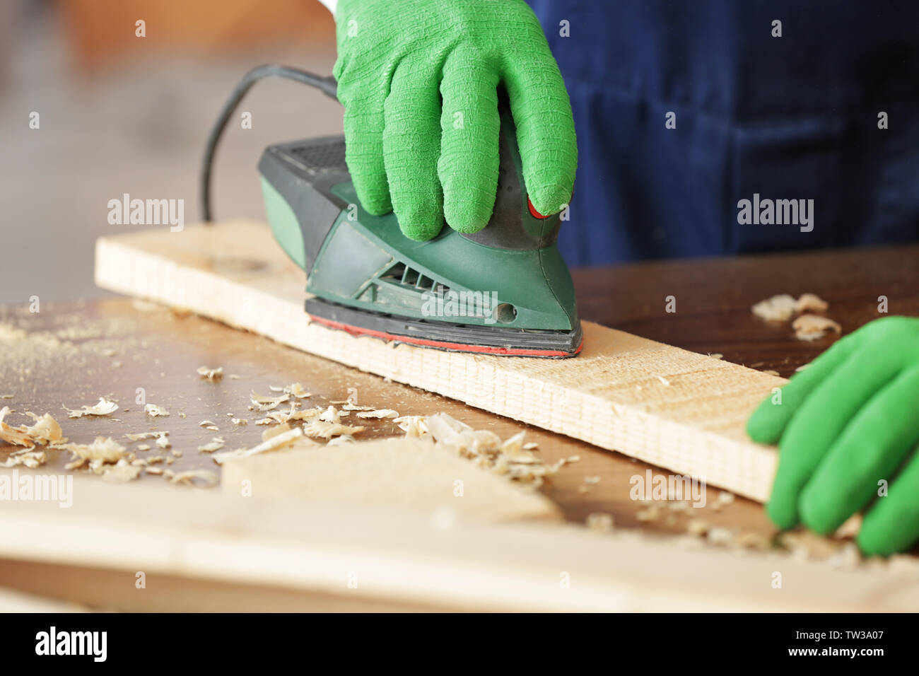 Adult carpenter craftsman electric sander hi-res stock photography and ...